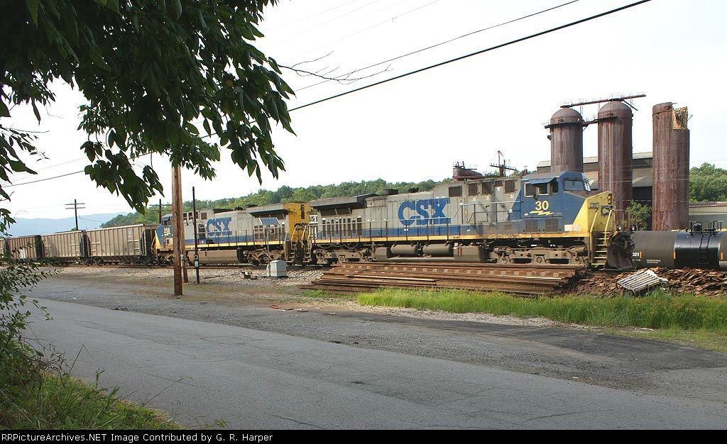 CSXT 30 leads N65202 on the Fourth of July past the disappearing E. J. Lavino ovens